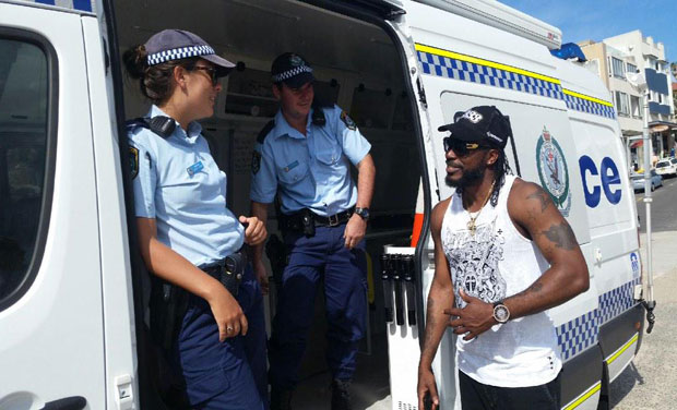 Lady police officer catches party-loving Chris Gayle?