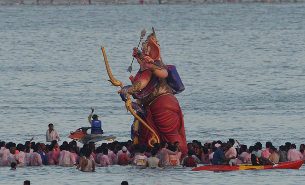 With pomp and show, devotees bid adieu to Lord Ganesh in Mumbai