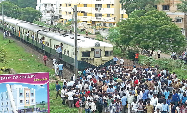 Angry passengers block trains running late