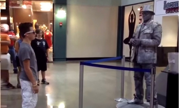 Dance face off: Man vs living statue