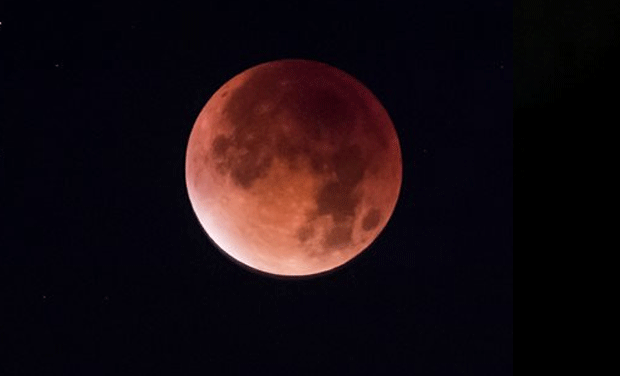 'Super blood moon' shines bright across the world