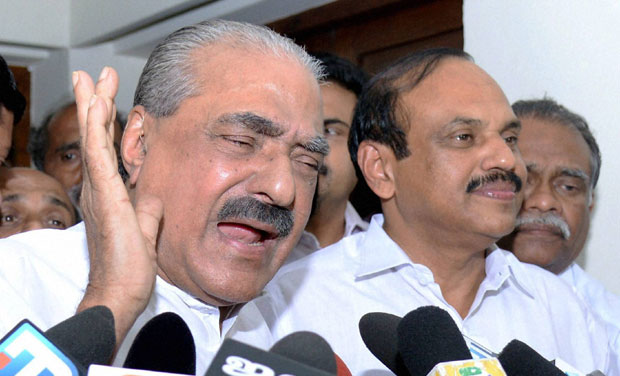 Kerala CM Oommen Chandy meets KM Mani, who resigned as Finance Minister