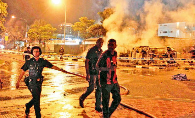 In pictures: Riots rock Singapore's Little India