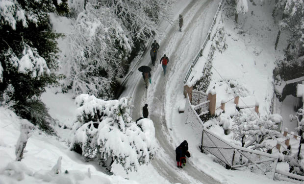 Pictures: Snowfall add to chill in North India