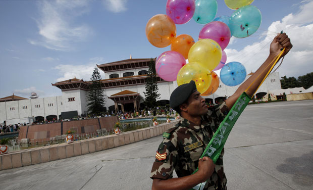 Protests and celebrations as Nepal adopts new constitution