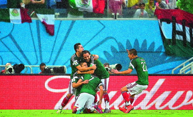 FIFA World Cup 2014: Rain dance as Mexicans make merry