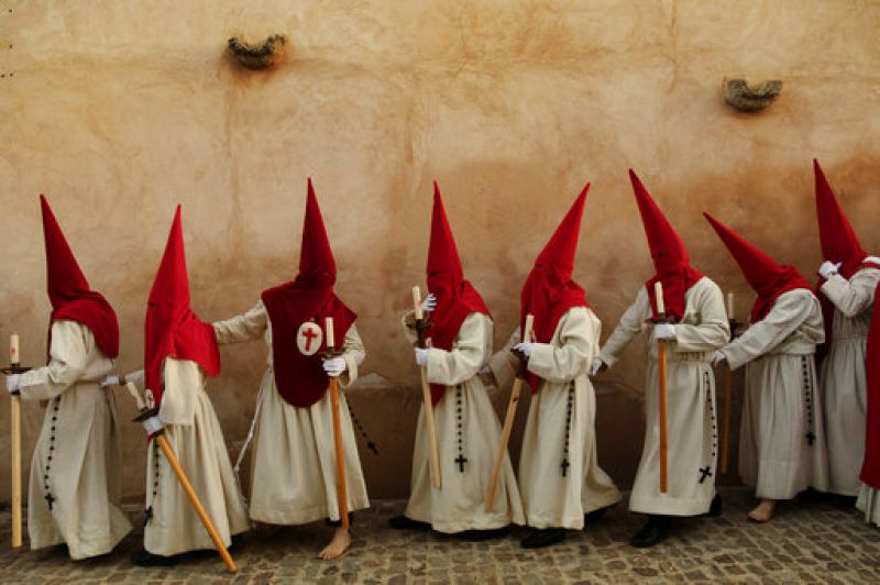 People take part in Holy Week rituals in Spain, Uruaguay and Guatemala
