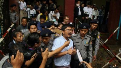 Two Reuters reporters get 7 years in jail in landmark secrets case