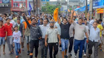 Protest against Delhi temple demolition turns violent, Bhim Army chief ...