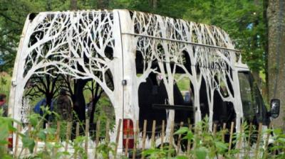 Artist makes unique tree designs from scrap metal