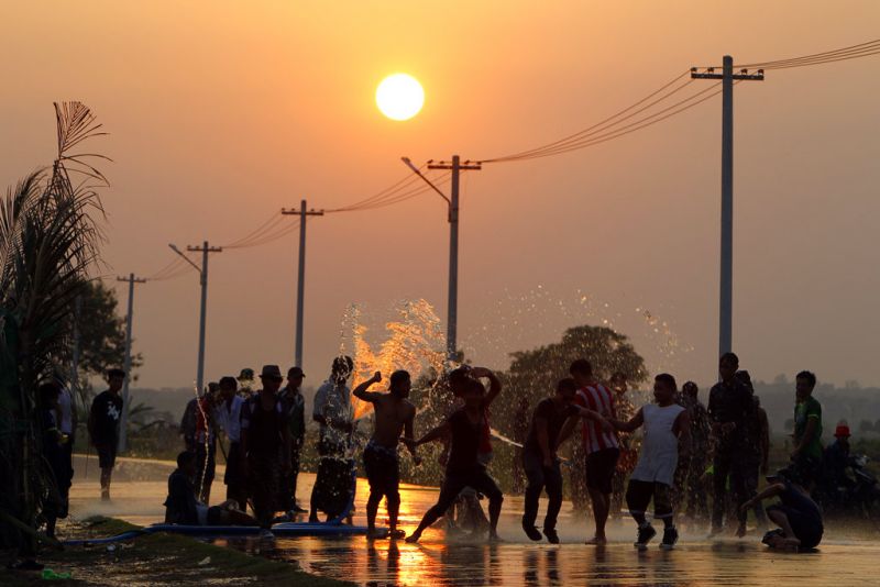 Myanmar Water Festival: Revelers celebrate descent of Thagyamin to Earth.