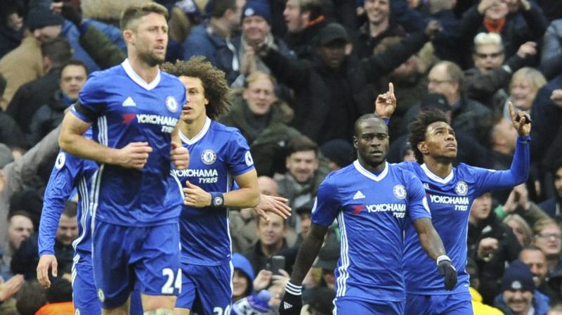 Chelsea rock title rivals City, rampant Arsenal up to second