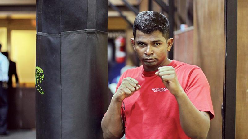 Kick boxing champion beats cancer, ready for a bout