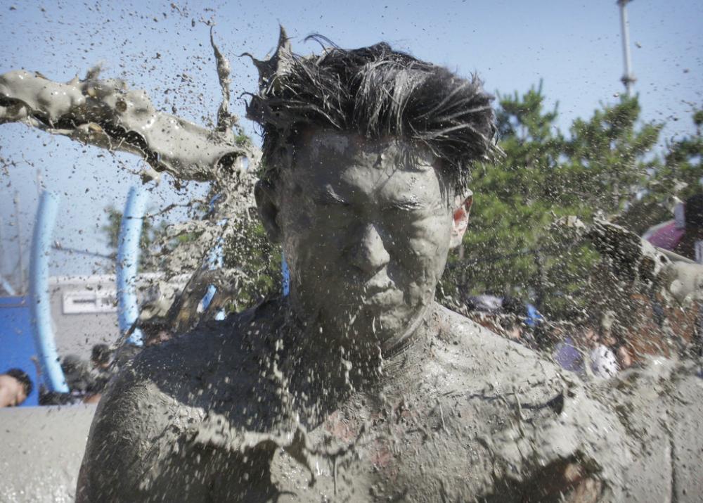 'Mud-slinging' was never this fun; Boryeong Mud Festival sees revellers ...