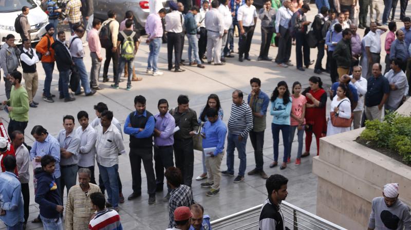 Demonetisation: On first payday, long queues as ATMs, banks run out of cash