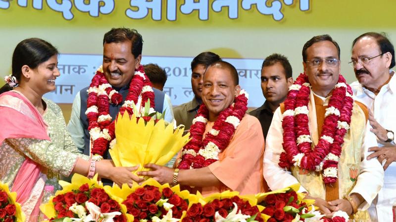 BJP names controversial leader Yogi Adityanath for UP CM post