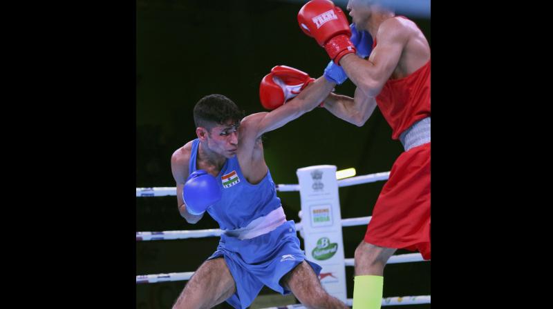 Indian boxer Gaurav Solanki enters pre-quarters of Asian Olympic ...