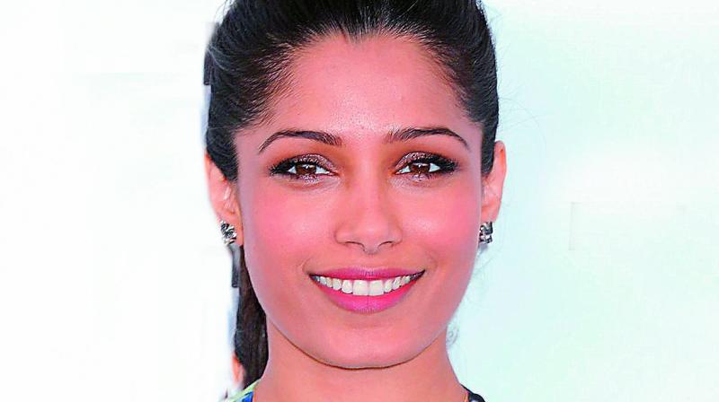 Black activists reduce Freida Pinto to tears