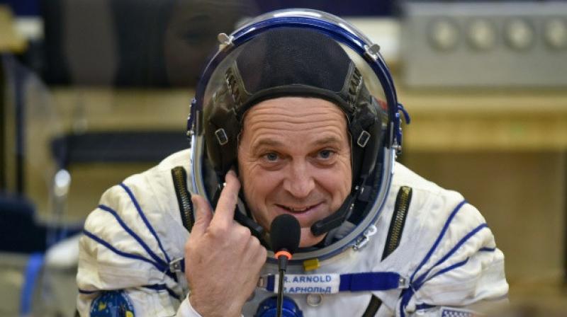 US astronauts make a spacewalk to perform ISS repairs