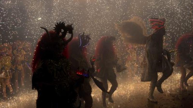 Bolivians dance to celebrate pagan-Catholic confluence in carnival