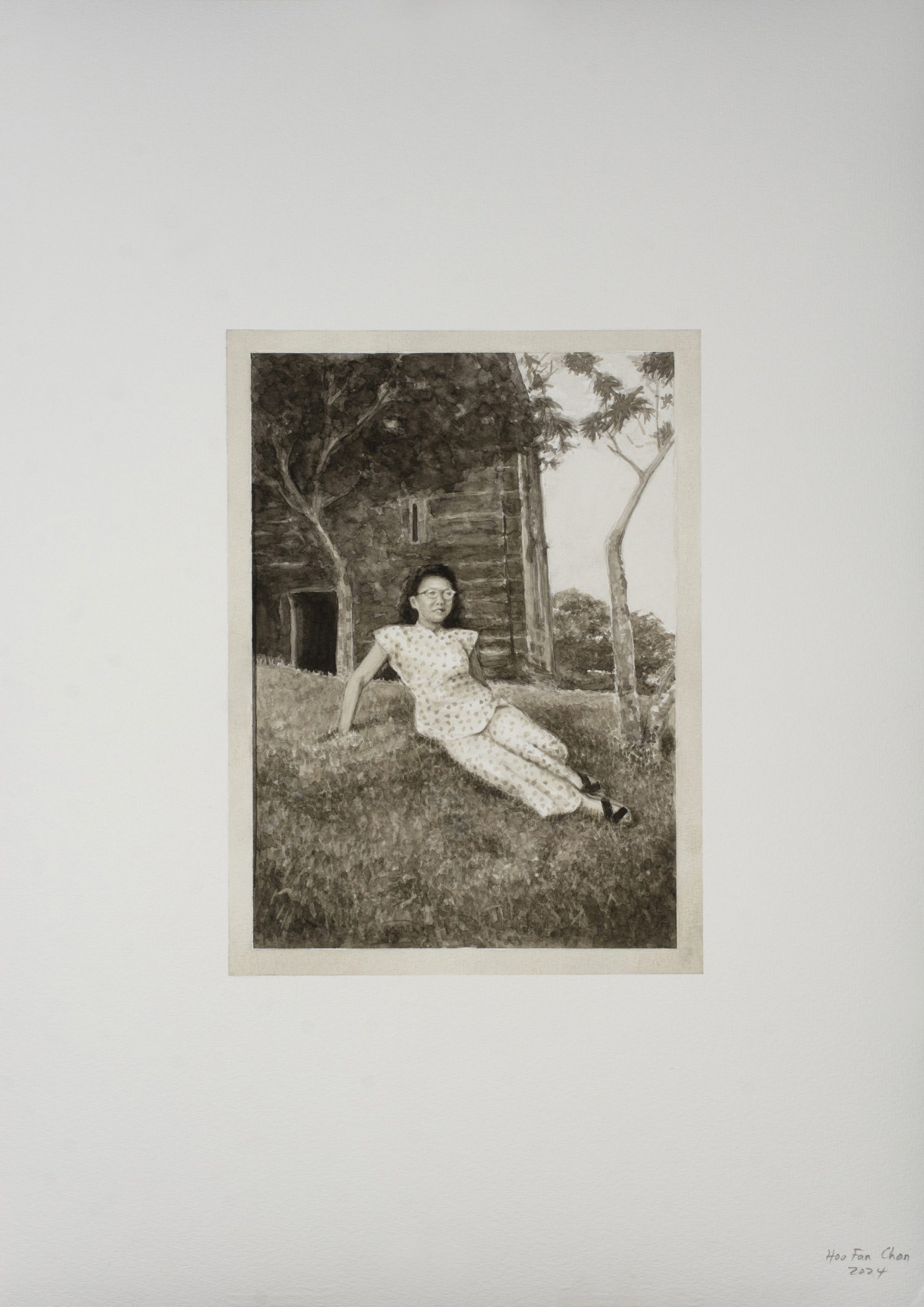 Reclining lady on lawn – S.E.A. Focus